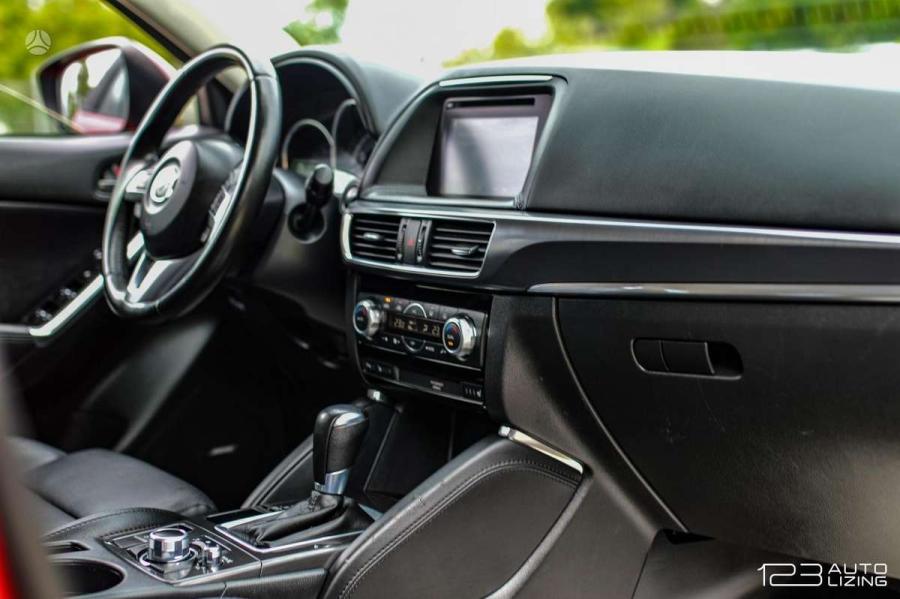 Red Mazda CX-5 2015 in Kretinga, with an engine capacity of 2.20 L and mileage of 193 thousand km for 9950 €, photo 17 on AUTOMOTO.COM.LV