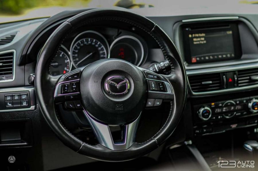 Red Mazda CX-5 2015 in Kretinga, with an engine capacity of 2.20 L and mileage of 193 thousand km for 9950 €, photo 18 on AUTOMOTO.COM.LV