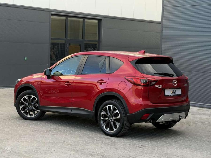 Red Mazda CX-5 2015 in Kaunas, with an engine capacity of 2.19 L and mileage of 188 thousand km for 9190 €, photo 4 on AUTOMOTO.COM.LV