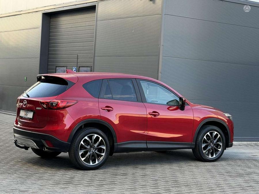 Red Mazda CX-5 2015 in Kaunas, with an engine capacity of 2.19 L and mileage of 188 thousand km for 9190 €, photo 6 on AUTOMOTO.COM.LV