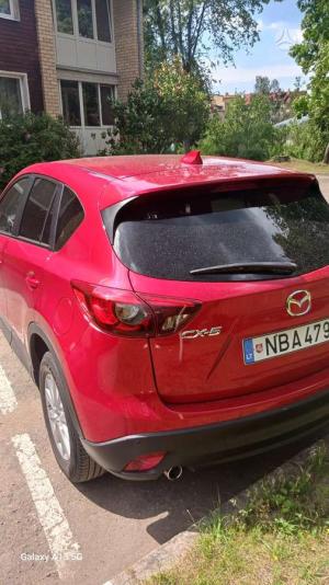 Sarkans Mazda CX-5 2015 Birštonas, ar dzinēja tilpumu 2.20 L un nobraukumu 190 tūkst. km par 9500 €, foto  vietnē AUTOMOTO.COM.LV