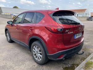 Red Mazda CX-5 2015 in Taurage, with an engine capacity of 2.19 L and mileage of 171 thousand km for 4750 €, photo 4 on AUTOMOTO.COM.LV