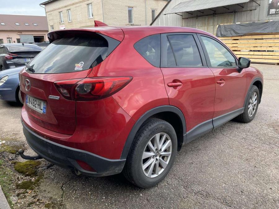 Red Mazda CX-5 2015 in Taurage, with an engine capacity of 2.19 L and mileage of 171 thousand km for 4750 €, photo 5 on AUTOMOTO.COM.LV