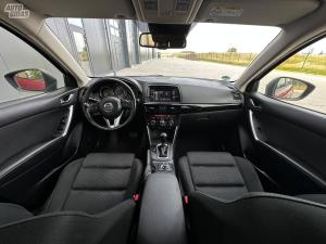 Red Mazda CX-5 2015 in Klaipeda, with an engine capacity of 2.20 L and mileage of 268 thousand km for 7400 €, photo 6 on AUTOMOTO.COM.LV