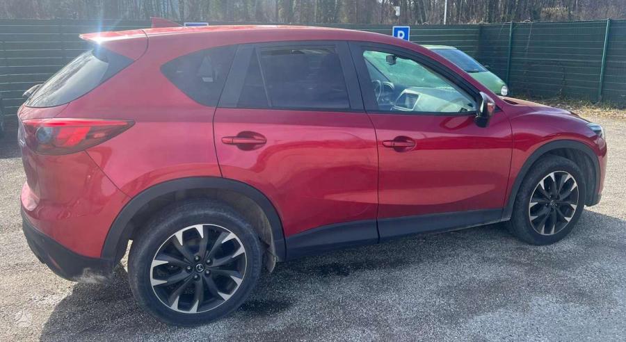 Sarkans Mazda CX-5 2016 Tauragė, ar dzinēja tilpumu 2.19 L un nobraukumu 181 tūkst. km par 5800 €, foto 4 vietnē AUTOMOTO.COM.LV