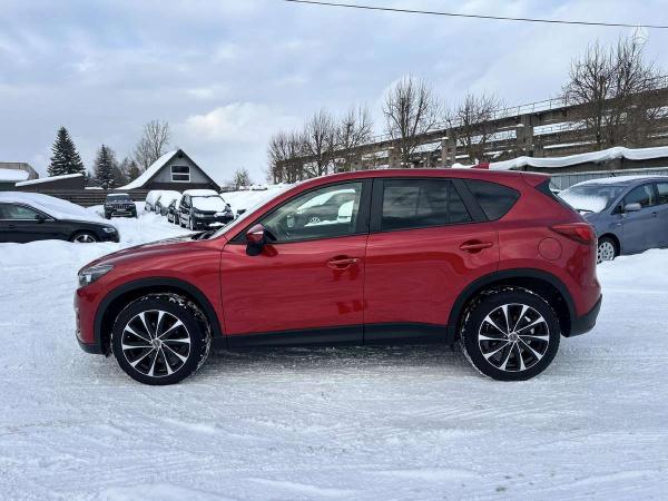 Red Mazda CX-5 2016 in Telschi, with an engine capacity of 2.19 L and mileage of 162 thousand km for 11800 €, photo 4 on AUTOMOTO.COM.LV