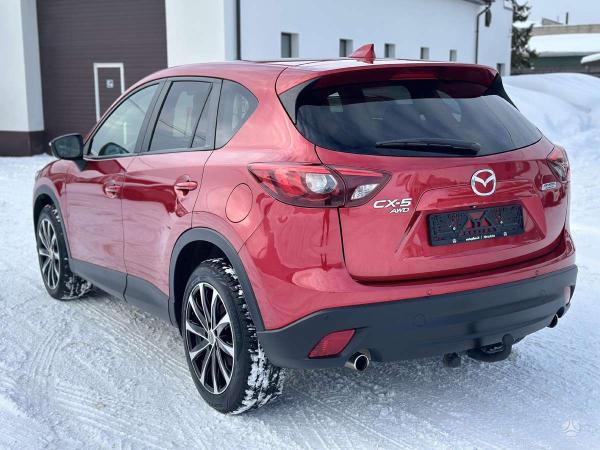 Red Mazda CX-5 2016 in Telschi, with an engine capacity of 2.19 L and mileage of 162 thousand km for 11800 €, photo 5 on AUTOMOTO.COM.LV