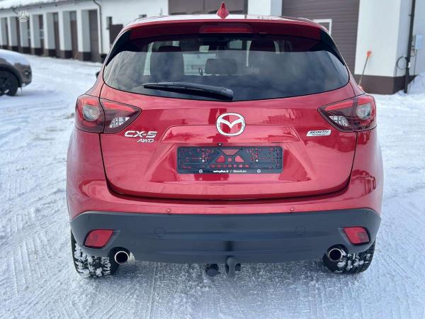 Red Mazda CX-5 2016 in Telschi, with an engine capacity of 2.19 L and mileage of 162 thousand km for 11800 €, photo 6 on AUTOMOTO.COM.LV