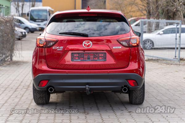 Red Mazda CX-5 2016 in Tallinn, with an engine capacity of 2.20 L and mileage of 168 thousand km for 10900 €, photo 6 on AUTOMOTO.COM.LV