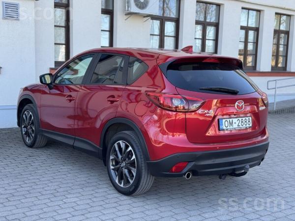 Red Mazda CX-5 2016 in Jelgava, with an engine capacity of 2.20 L and mileage of 202 thousand km for 10900 €, photo 6 on AUTOMOTO.COM.LV