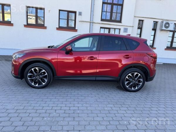 Red Mazda CX-5 2016 in Jelgava, with an engine capacity of 2.20 L and mileage of 202 thousand km for 10900 €, photo 8 on AUTOMOTO.COM.LV
