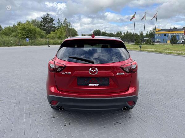Red Mazda CX-5 2016 in Telschi, with an engine capacity of 2.19 L and mileage of 201 thousand km for 7999 €, photo 5 on AUTOMOTO.COM.LV