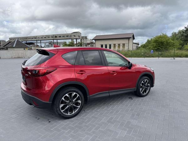 Red Mazda CX-5 2016 in Telschi, with an engine capacity of 2.19 L and mileage of 201 thousand km for 7999 €, photo 7 on AUTOMOTO.COM.LV