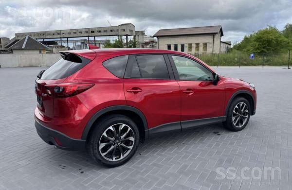 Red Mazda CX-5 2016 in Telschi, with an engine capacity of 2.20 L and mileage of 200 thousand km for 7990 €, photo 5 on AUTOMOTO.COM.LV