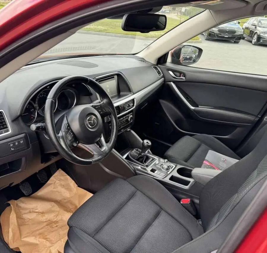 Red Mazda CX-5 2016 in Telschi, with an engine capacity of 2.20 L and mileage of 200 thousand km for 7990 €, photo 15 on AUTOMOTO.COM.LV