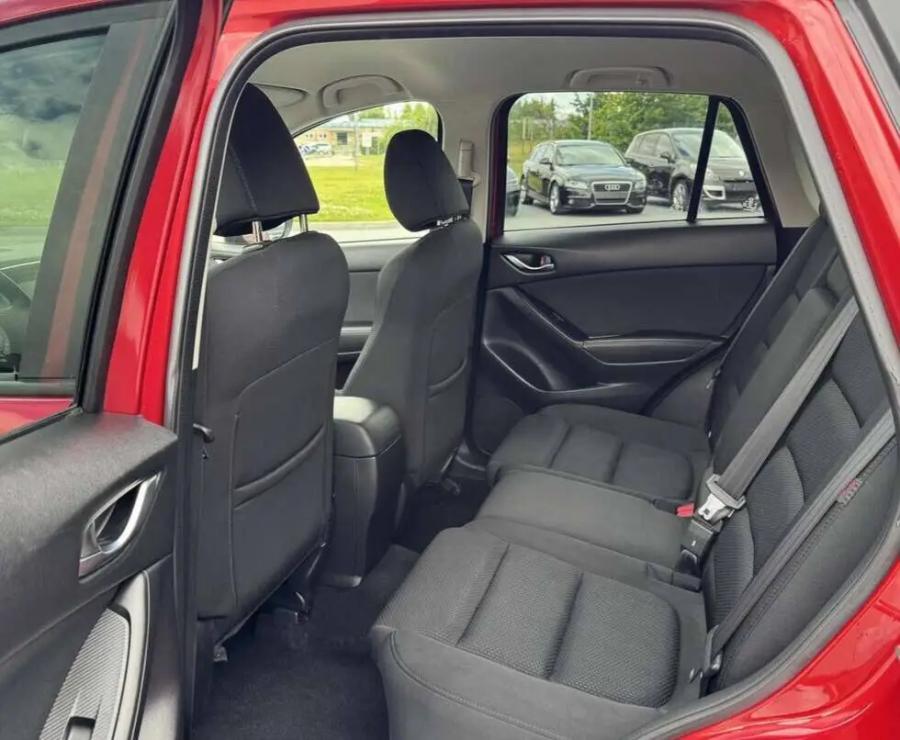 Red Mazda CX-5 2016 in Telschi, with an engine capacity of 2.20 L and mileage of 200 thousand km for 7990 €, photo 17 on AUTOMOTO.COM.LV