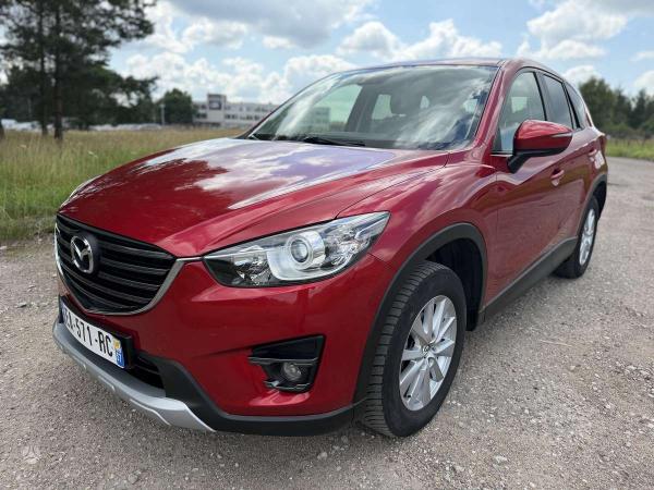 Red Mazda CX-5 2016 in Taurage, with an engine capacity of 2.19 L and mileage of 168 thousand km for 7200 €, photo 1 on AUTOMOTO.COM.LV