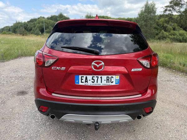 Red Mazda CX-5 2016 in Taurage, with an engine capacity of 2.19 L and mileage of 168 thousand km for 7200 €, photo 4 on AUTOMOTO.COM.LV