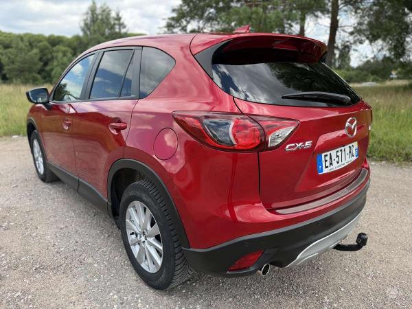 Red Mazda CX-5 2016 in Taurage, with an engine capacity of 2.19 L and mileage of 168 thousand km for 7200 €, photo 6 on AUTOMOTO.COM.LV