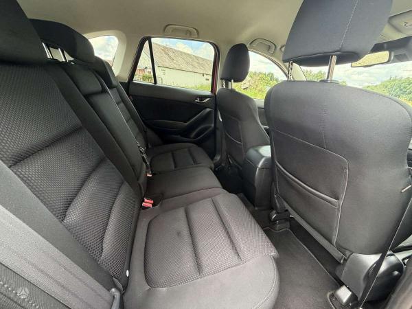 Red Mazda CX-5 2016 in Taurage, with an engine capacity of 2.19 L and mileage of 168 thousand km for 7200 €, photo 10 on AUTOMOTO.COM.LV