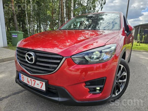 Red Mazda CX-5 2016 in Riga, with an engine capacity of 2.20 L and mileage of 227 thousand km for 9250 €, photo 1 on AUTOMOTO.COM.LV