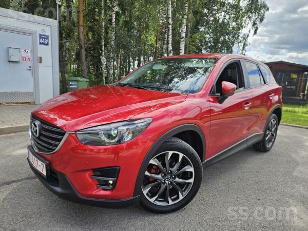 Red Mazda CX-5 2016 in Riga, with an engine capacity of 2.20 L and mileage of 227 thousand km for 9250 €, photo 2 on AUTOMOTO.COM.LV
