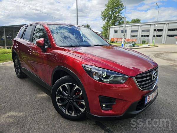 Red Mazda CX-5 2016 in Riga, with an engine capacity of 2.20 L and mileage of 227 thousand km for 9250 €, photo 8 on AUTOMOTO.COM.LV