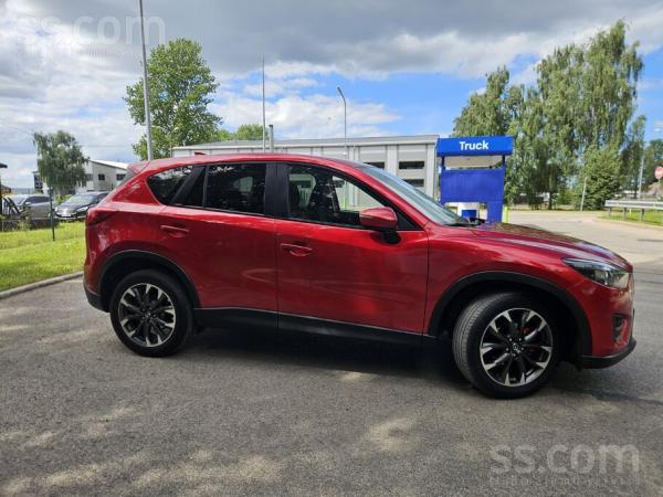 Red Mazda CX-5 2016 in Riga, with an engine capacity of 2.20 L and mileage of 227 thousand km for 9250 €, photo 9 on AUTOMOTO.COM.LV
