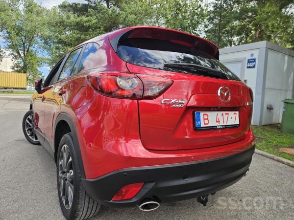 Red Mazda CX-5 2016 in Riga, with an engine capacity of 2.20 L and mileage of 227 thousand km for 9250 €, photo 10 on AUTOMOTO.COM.LV