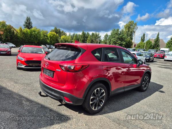 Mazda CX-5 2016 in Tartu on AUTOMOTO.COM.LV Red Mazda CX-5 2016 in Tartu, with an engine capacity of 2.20 L and mileage of 160 thousand km for 12990 €, photo 3 on AUTOMOTO.COM.LV