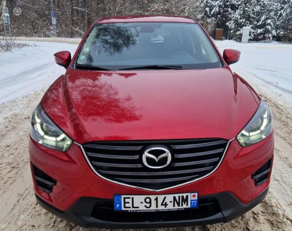 Red Mazda CX-5 2017 in Panevezys, with an engine capacity of 2.19 L and mileage of 127 thousand km for 6900 €, photo 3 on AUTOMOTO.COM.LV