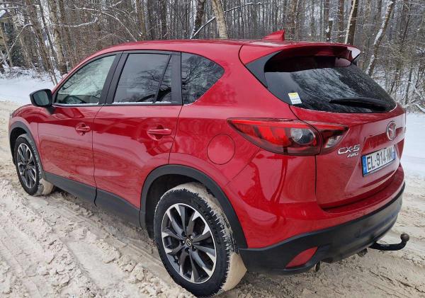 Red Mazda CX-5 2017 in Panevezys, with an engine capacity of 2.19 L and mileage of 127 thousand km for 6900 €, photo 4 on AUTOMOTO.COM.LV