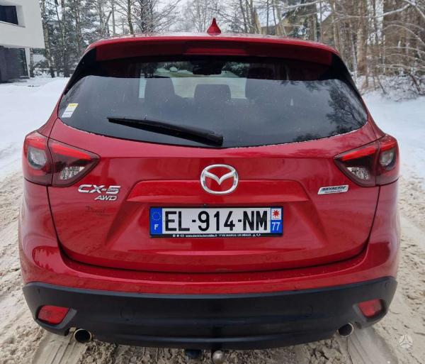 Red Mazda CX-5 2017 in Panevezys, with an engine capacity of 2.19 L and mileage of 127 thousand km for 6900 €, photo 5 on AUTOMOTO.COM.LV