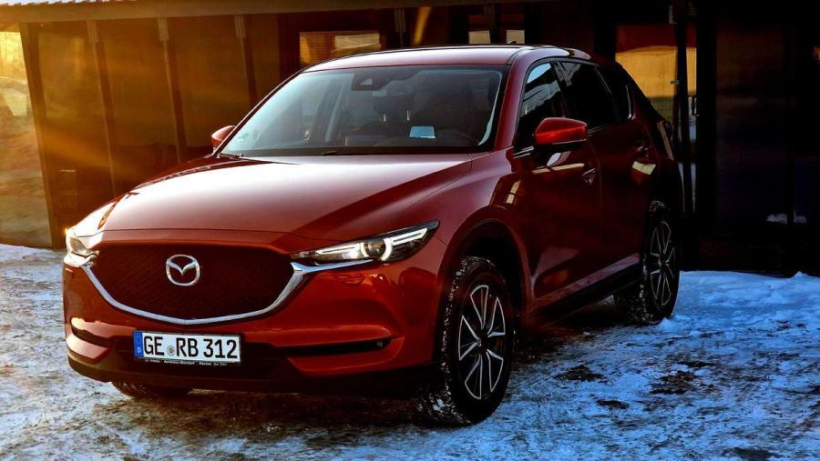 Red Mazda CX-5 2017 in Kretinga, with an engine capacity of 2.20 L and mileage of 248 thousand km for 12999 €, photo 5 on AUTOMOTO.COM.LV