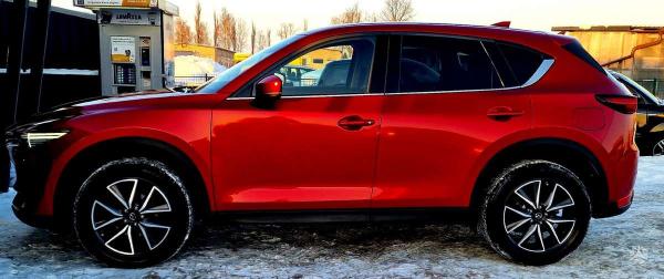 Red Mazda CX-5 2017 in Kretinga, with an engine capacity of 2.20 L and mileage of 248 thousand km for 12999 €, photo 7 on AUTOMOTO.COM.LV