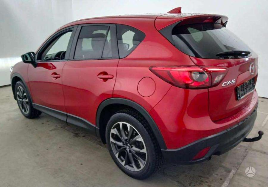 Red Mazda CX-5 2017 in Vilnius, with an engine capacity of 2.19 L and mileage of 140 thousand km for 11800 €, photo 4 on AUTOMOTO.COM.LV