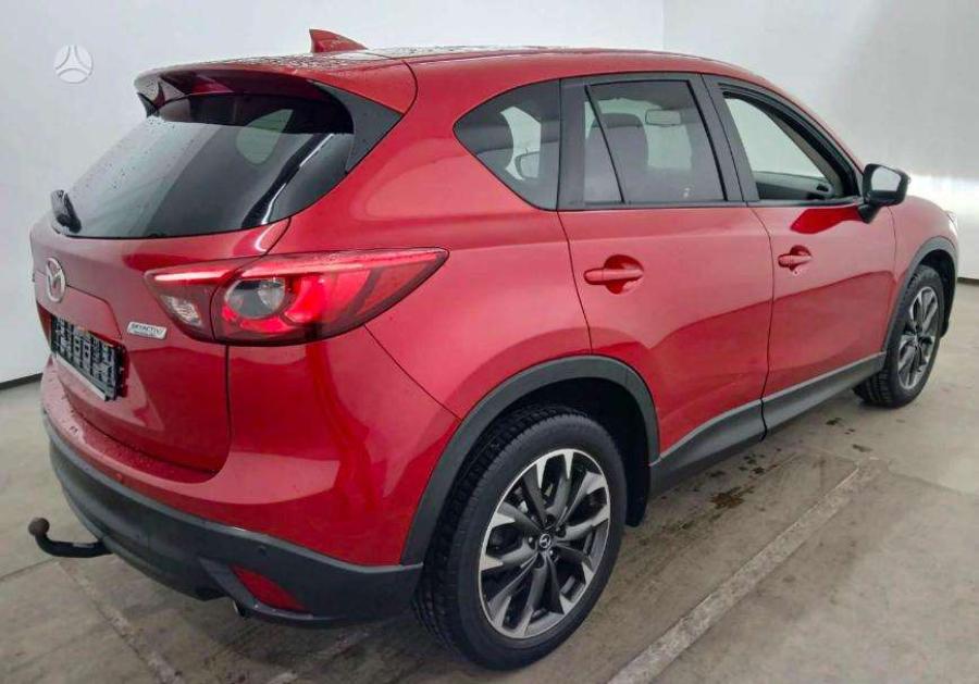 Red Mazda CX-5 2017 in Vilnius, with an engine capacity of 2.19 L and mileage of 140 thousand km for 11800 €, photo 5 on AUTOMOTO.COM.LV