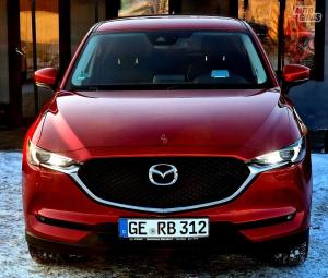 Red Mazda CX-5 2017 in Kretinga, with an engine capacity of 2.20 L and mileage of 248 thousand km for 12999 €, photo 2 on AUTOMOTO.COM.LV