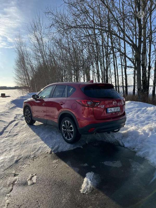 Red Mazda CX-5 2017 in Klaipeda, with an engine capacity of 2.19 L and mileage of 244 thousand km for 10500 €, photo 4 on AUTOMOTO.COM.LV