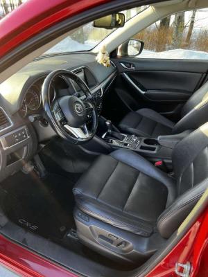 Red Mazda CX-5 2017 in Klaipeda, with an engine capacity of 2.19 L and mileage of 244 thousand km for 10500 €, photo 6 on AUTOMOTO.COM.LV