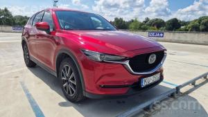 Red Mazda CX-5 2017 in Riga, with an engine capacity of 2.20 L and mileage of 221 thousand km for 14700 €, photo 3 on AUTOMOTO.COM.LV