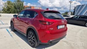 Red Mazda CX-5 2017 in Riga, with an engine capacity of 2.20 L and mileage of 221 thousand km for 14700 €, photo 5 on AUTOMOTO.COM.LV