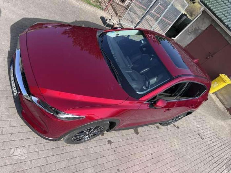 Red Mazda CX-5 2017 in Vilnius, with an engine capacity of 2.19 L and mileage of 238 thousand km for 13800 €, photo 6 on AUTOMOTO.COM.LV