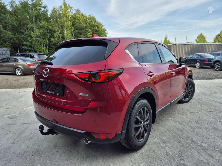 Red Mazda CX-5 2017 in Utena, with an engine capacity of 2.19 L and mileage of 205 thousand km for 13490 €, photo 3 on AUTOMOTO.COM.LV