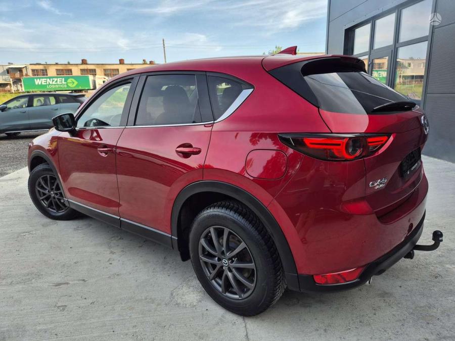 Red Mazda CX-5 2017 in Utena, with an engine capacity of 2.19 L and mileage of 205 thousand km for 13490 €, photo 4 on AUTOMOTO.COM.LV