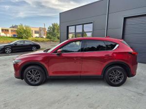 Red Mazda CX-5 2017 in Utena, with an engine capacity of 2.19 L and mileage of 205 thousand km for 13490 €, photo 6 on AUTOMOTO.COM.LV