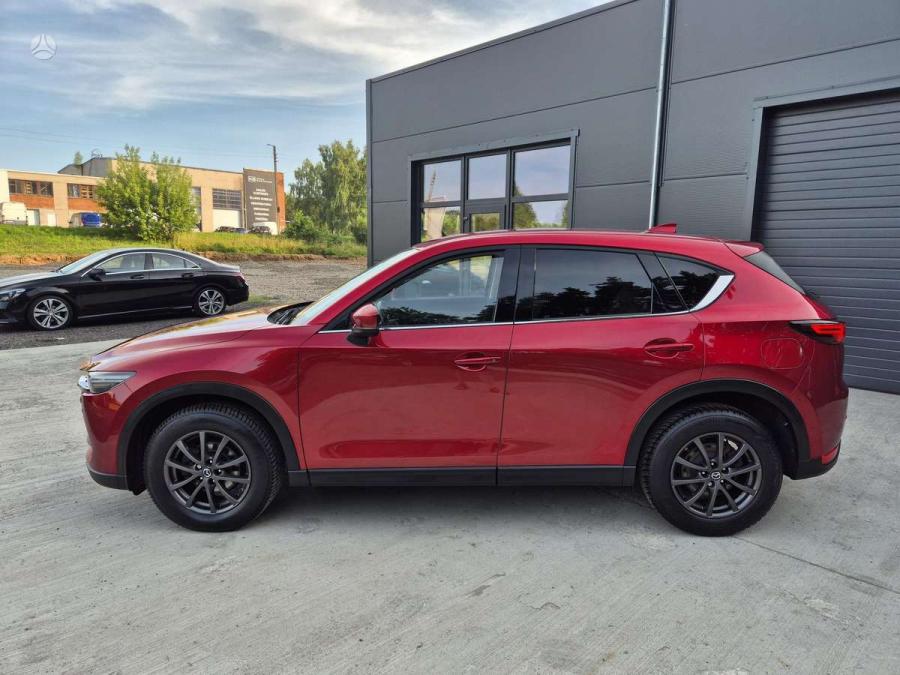 Red Mazda CX-5 2017 in Utena, with an engine capacity of 2.19 L and mileage of 205 thousand km for 13490 €, photo 6 on AUTOMOTO.COM.LV