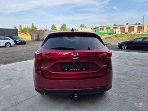 Red Mazda CX-5 2017 in Utena, with an engine capacity of 2.19 L and mileage of 205 thousand km for 13490 €, photo 9 on AUTOMOTO.COM.LV