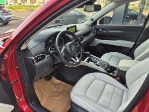 Red Mazda CX-5 2017 in Utena, with an engine capacity of 2.19 L and mileage of 205 thousand km for 13490 €, photo 10 on AUTOMOTO.COM.LV