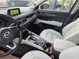 Red Mazda CX-5 2017 in Utena, with an engine capacity of 2.19 L and mileage of 205 thousand km for 13490 €, photo 16 on AUTOMOTO.COM.LV